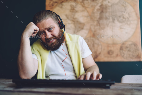 Nervous male gamer playing videogame Stock Photo by GaudiLab | PhotoDune