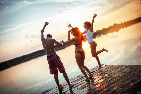 Summer fun at the lake Stock Photo by milanzeremski | PhotoDune