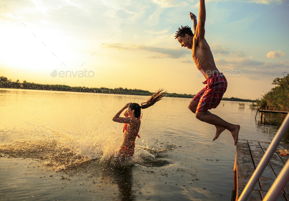 Summer fun at the lake Stock Photo by milanzeremski | PhotoDune