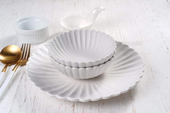 Modern ceramic crockery, trendy tableware Stock Photo by EdgunnStudio