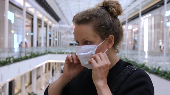 Woman Wearing Face Mask in the Shopping Mall. Shopping During Second ...