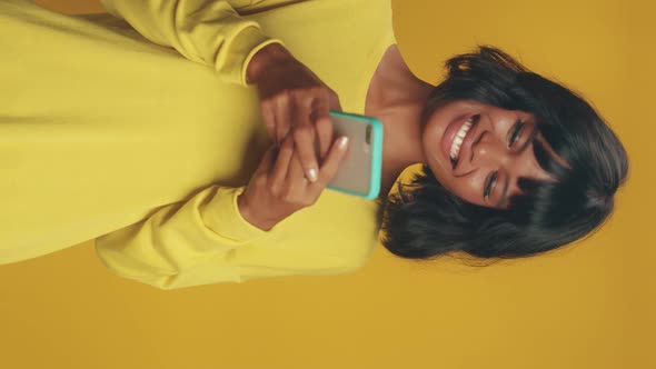 Smiling Glad Woman Checks Mobile Application Glad to Receive Pleasant ...