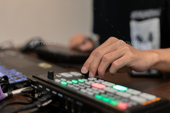 Close up a hand working of switch controller handle video of broadcast ...