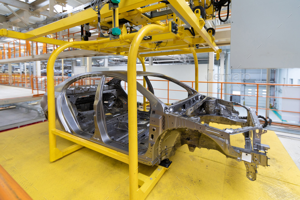 body of car on conveyor Modern Assembly of cars at plant. automated ...