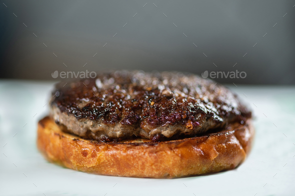 Burger Sandwich without Top Bun and Topping Stock Photo by microgen