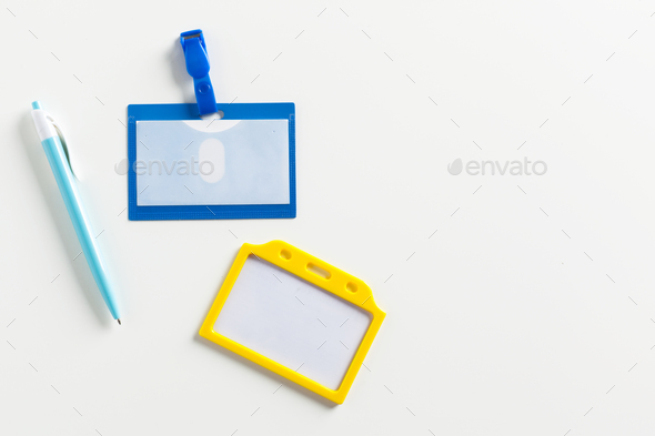 Name tag and a pen Stock Photo by FabrikaPhoto | PhotoDune