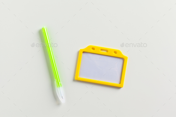 Name tag and a pen Stock Photo by FabrikaPhoto | PhotoDune