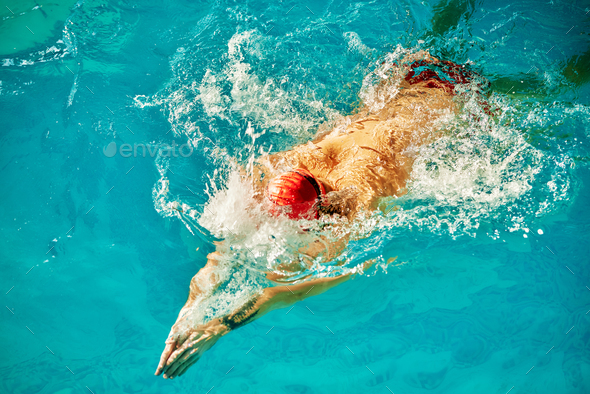 Aerial Top View Male Swimmer Swimming in Swimming Pool. Professional ...