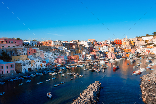 Procida colored typical houses near ocean in summer Italian vacation ...