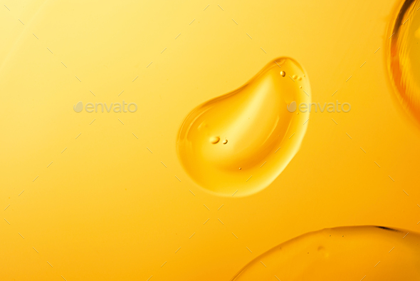 Texture of hyaluronic acid, nourishing yellow oil serum Stock Photo by ...