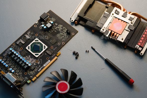 Top view of disassembled graphics card XFX GPU AMD fan screws ...