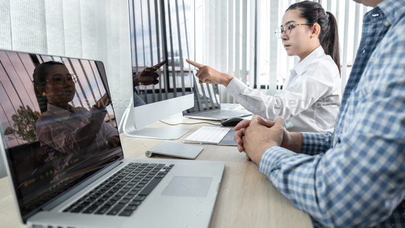 Team of two professional programmers working on website projects in ...