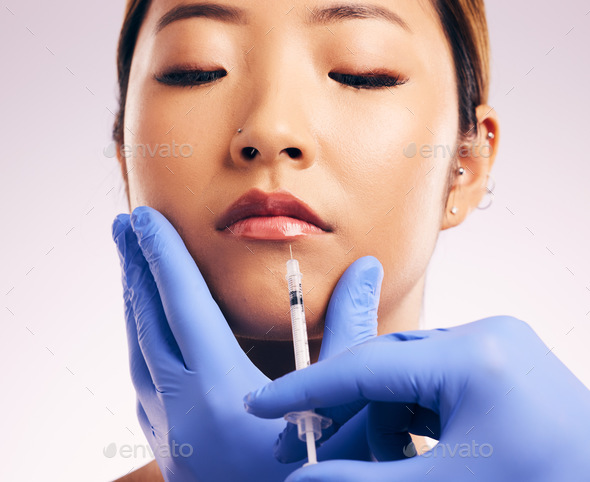 Lips injection, skincare and woman with plastic surgery in studio ...
