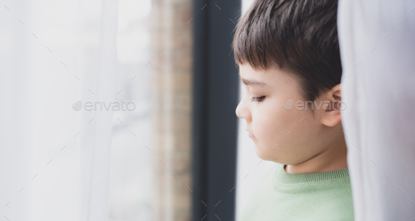 Portrait Kid Boy, Side view School Kid with sad face, Young boy looks ...