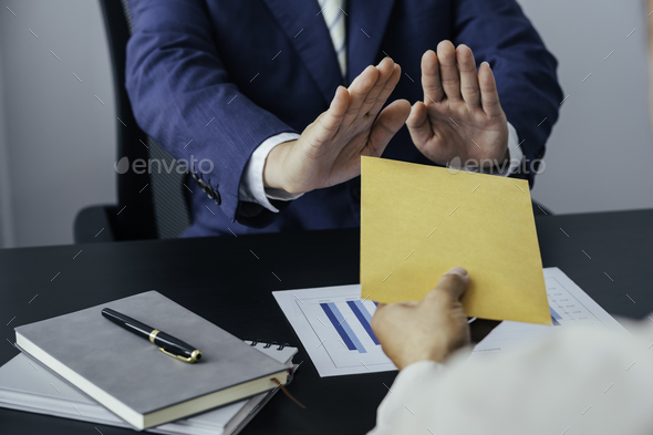 Honest businessman raising his hand Reject bribery from business people ...