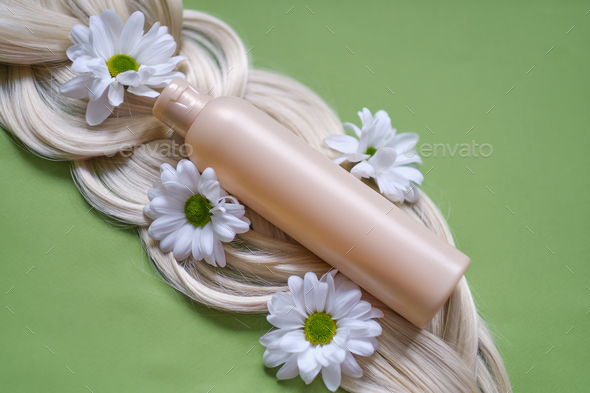 hair care concept with shampoo on green background. Flat top view. spa ...