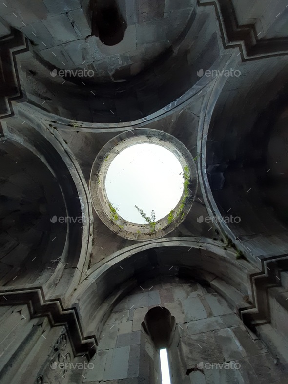 Low angle shot of the ceiling of ruins of an ancient Armenian monastery ...