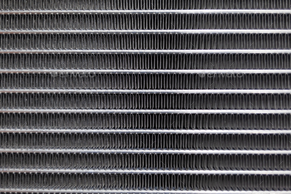 Texture of a car radiator. Engine cooler background. Vintage style ...