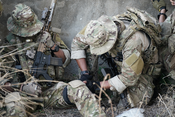 Soldier in full US MARSOC armed with assault rifle run through the ...