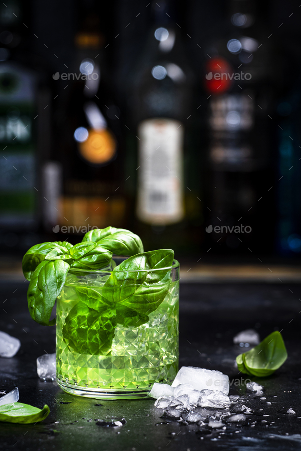 Basil smash alcoholic cocktail drink with dry gin, syrup, lemon, basil ...