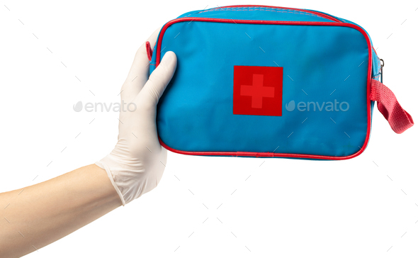 First aid kit with hand Stock Photo by FabrikaPhoto | PhotoDune