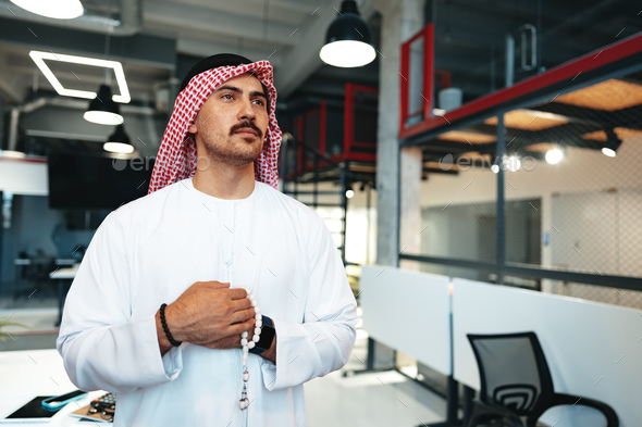 Successful muslim businessmen in traditional outfit in his office Stock ...