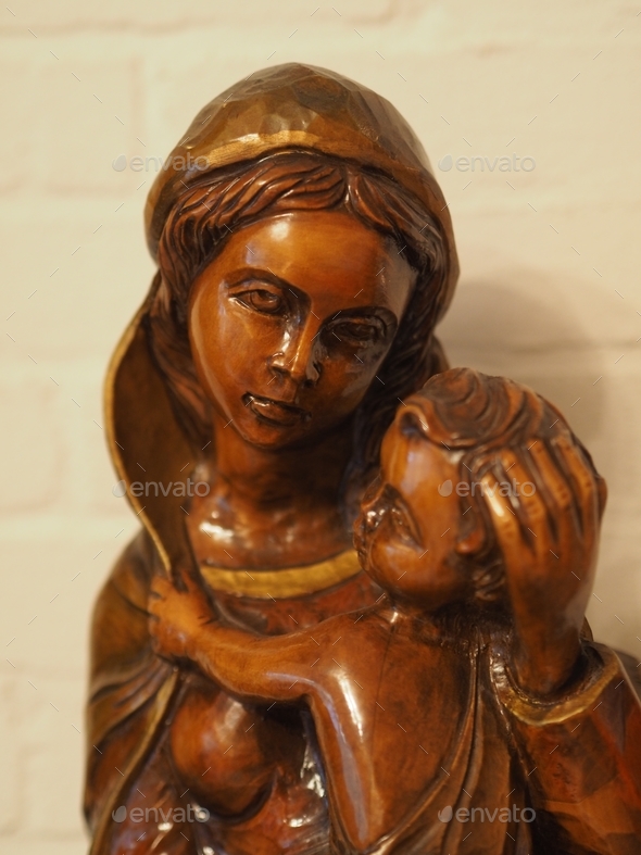 Vertical shot of a wooden Mother Marry sculpting statue Stock Photo by ...