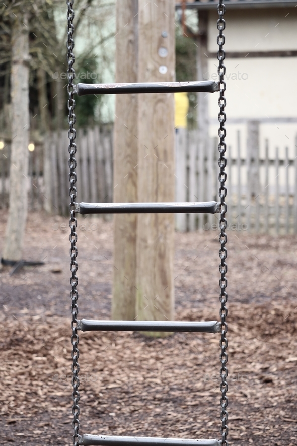 Vertical shot of a chain ladder at the park Stock Photo by wirestock