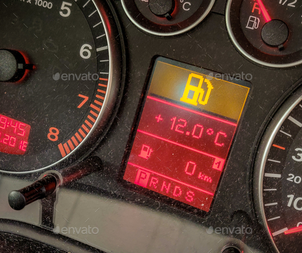 Closeup of a low fuel indicator on a car's dashboard Stock Photo by ...