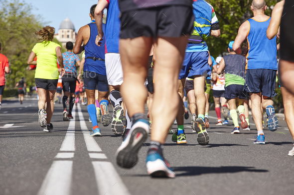 Marathon runners on the street. Healthy lifestyle. Athletes effort ...