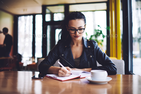 Wistful woman with notepad in cafe Stock Photo by GaudiLab | PhotoDune