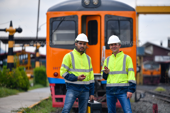 Engineer under inspection and checking construction process railway and ...