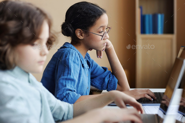 School children working on computers in class Stock Photo by ...