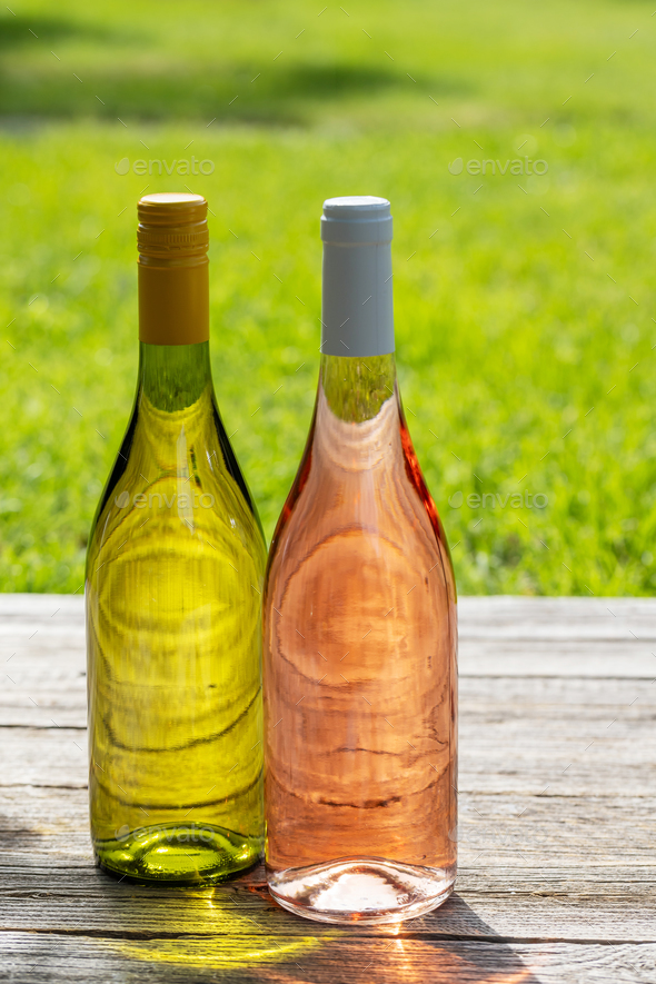 White and rose wine bottles Stock Photo by karandaev | PhotoDune