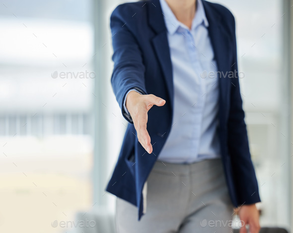 Closeup of caucasian business woman extending hand forward to greet ...
