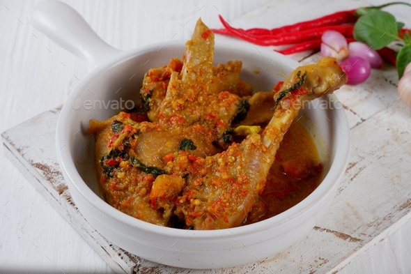 Indonesian traditional food.Ayam woku is a typical dish of Manado ...