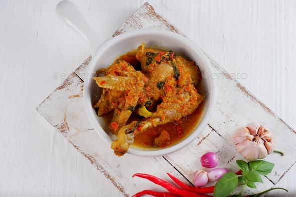 Indonesian traditional food.Ayam woku is a typical dish of Manado ...