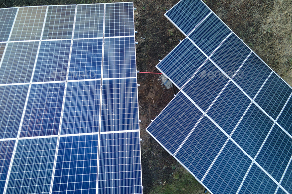 Solar photovoltaic panels mounted on stand-alone frame on backyard ...