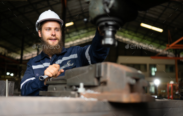 Portrait of mechanical engineers are checking the working condition of ...