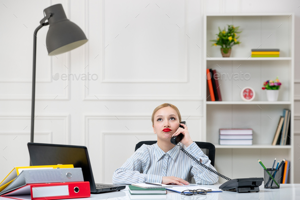 secretary cute lovely blonde young girl in shirt in office with work ...