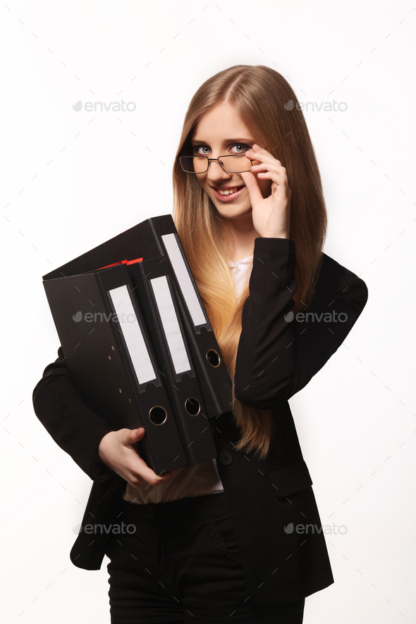 Beautiful young business woman with folder of documents isolated on ...