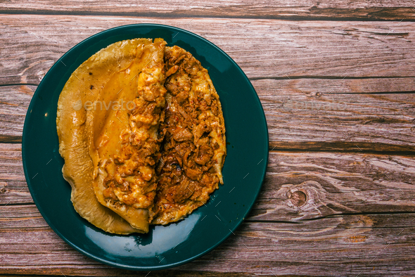 Gringa, typical Mexican dish. Gringa pastor a la diabla served with ...