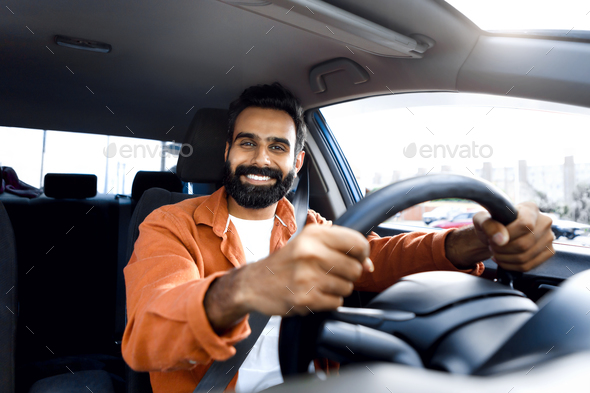Joyful Middle Eastern Man Smiling Posing Driving New Vehicle Stock ...