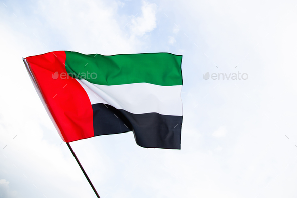 Waving fabric texture of the flag with color of United Arab Emirates ...