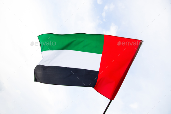 Waving fabric texture of the flag with color of United Arab Emirates ...