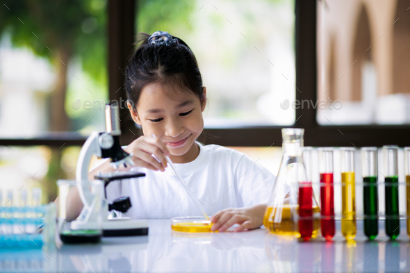 Girl scientist, fun science experiments for kids, science lab. Stock ...
