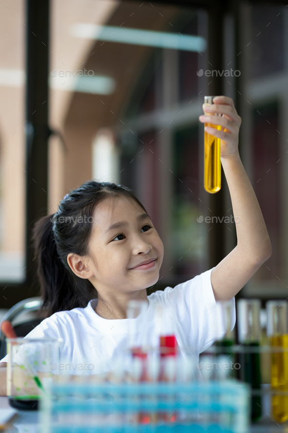 Girl scientist, fun science experiments for kids, science lab. Stock ...