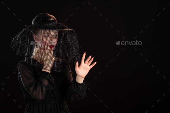 mourning female dressed in black for funeral black background death ...