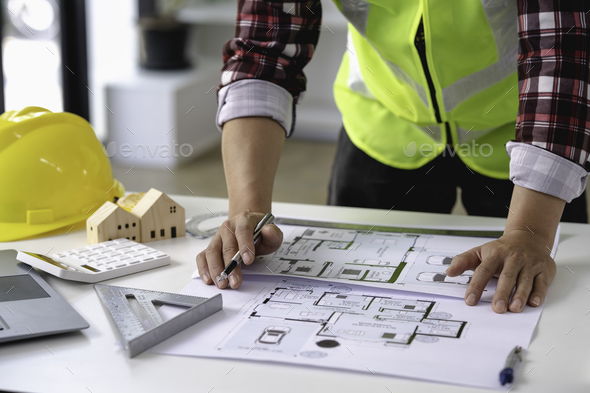 concept architect The engineer is measuring the distance to calculate ...