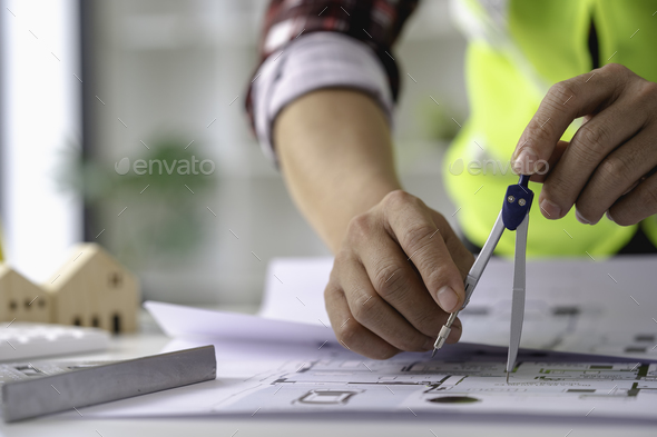 concept architect The engineer is measuring the distance to calculate ...